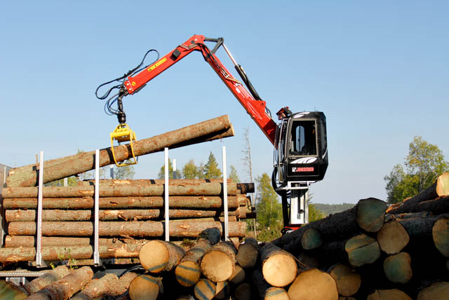 New timber handling crane with cab provides a safe and durable truck ...